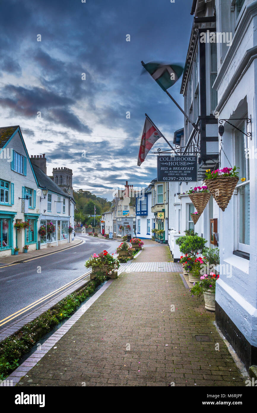 A deserted street in the small seaside town of Beer in Devon on a wet ...