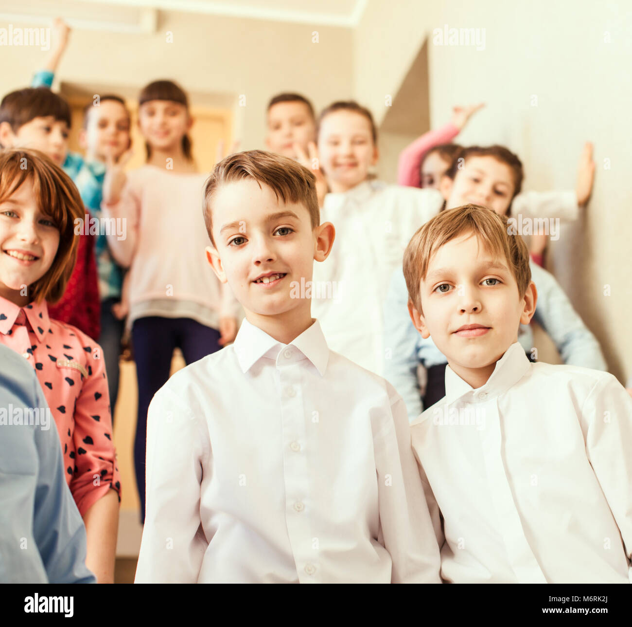 Pupils standing on the stairs Stock Photo - Alamy