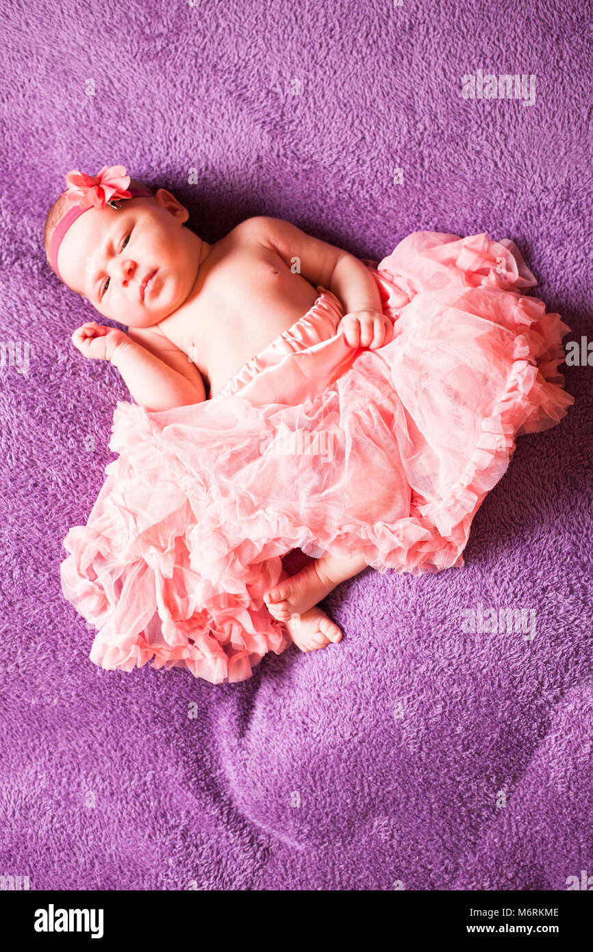 Newborn girl in tutu Stock Photo - Alamy