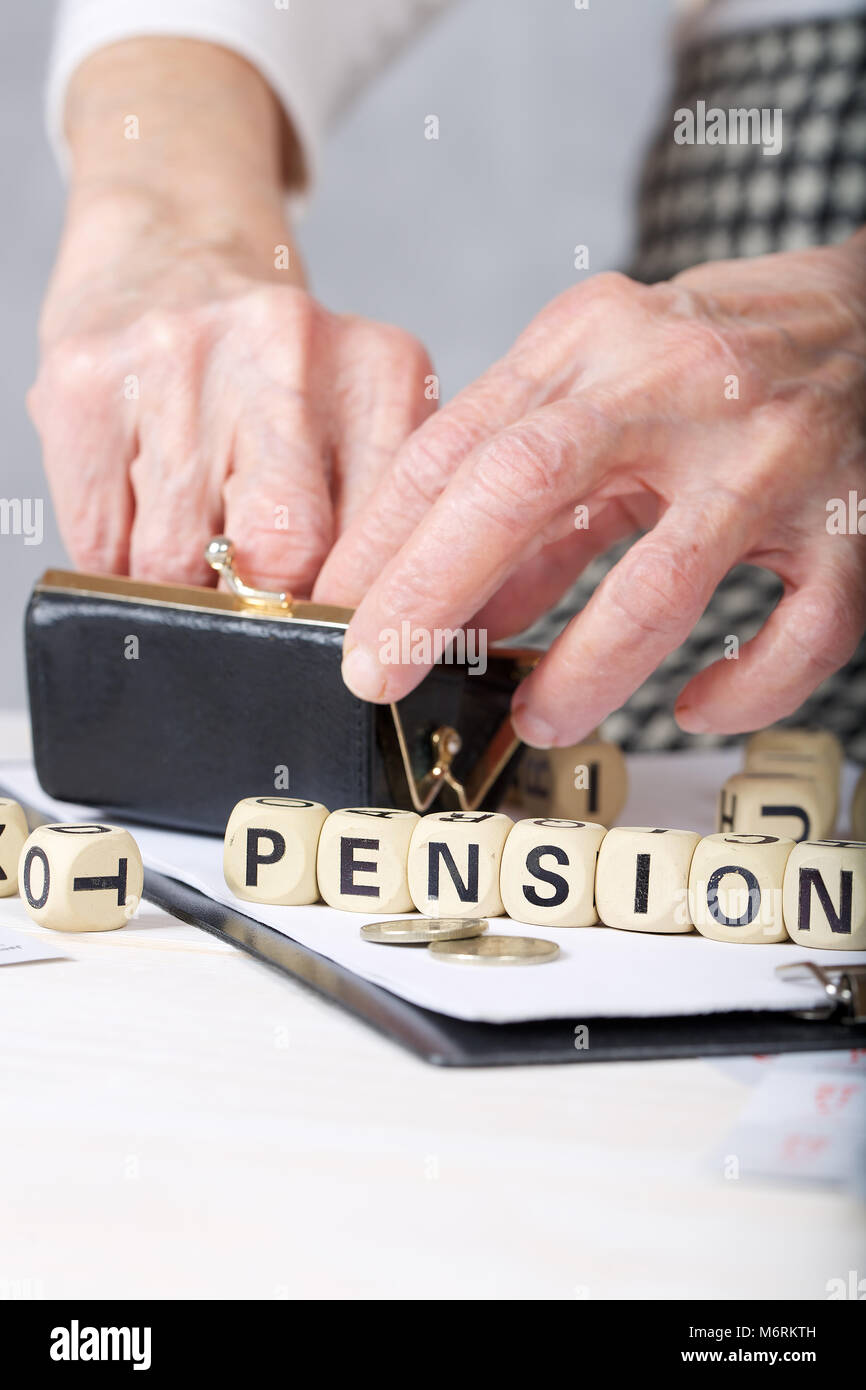 Word pension is composed of small wooden dices Stock Photo - Alamy