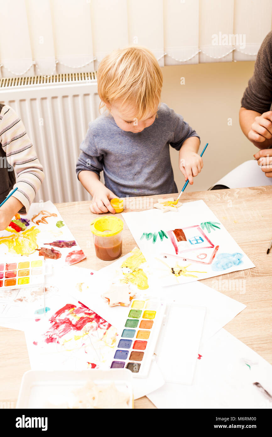 Boy is painting Stock Photo - Alamy