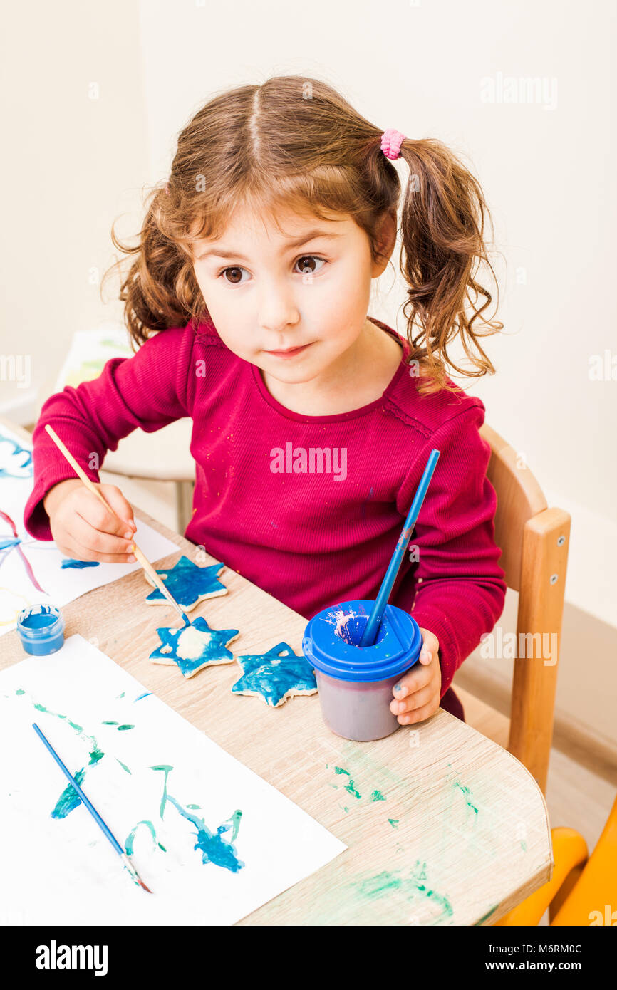 Girl is painting Stock Photo - Alamy