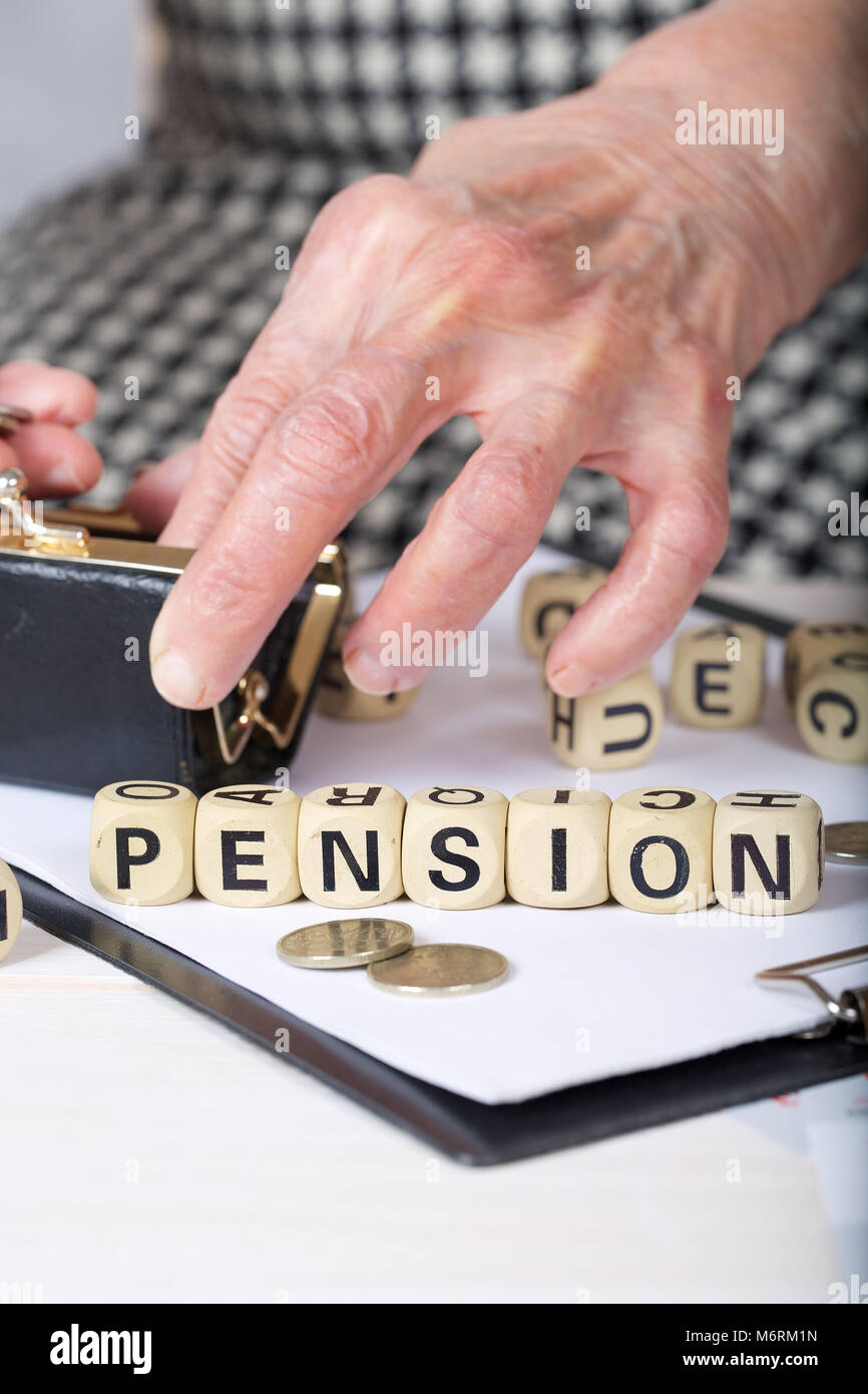 Word pension is composed of small wooden dices Stock Photo - Alamy