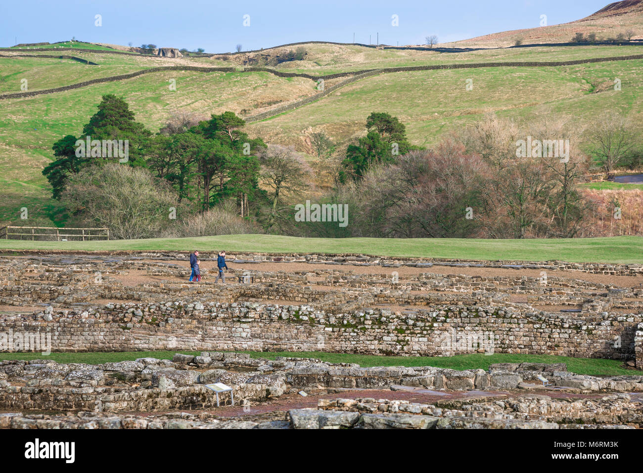 Vindolanda Roman Fort, visitors explore the excavated Roman barracks ...