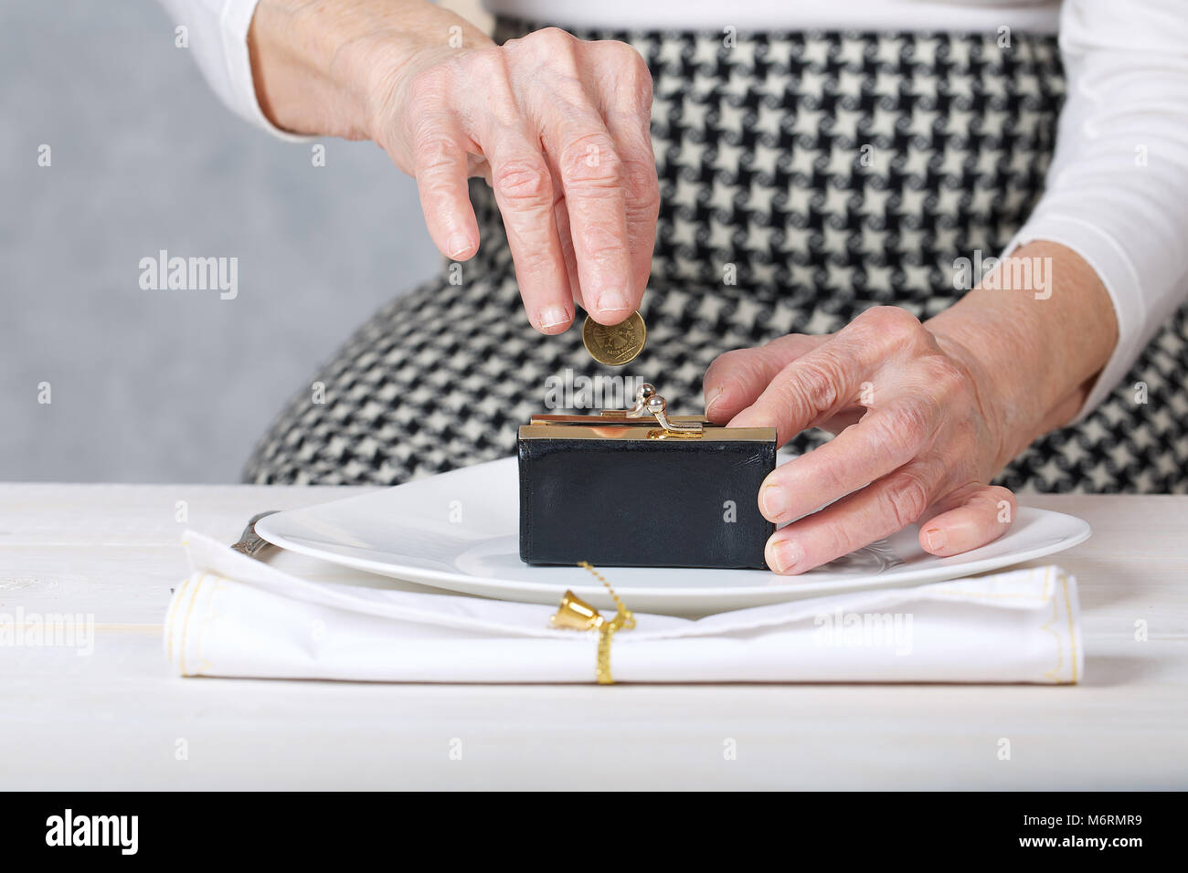 Old woman shows her empty lunch plate Stock Photo - Alamy