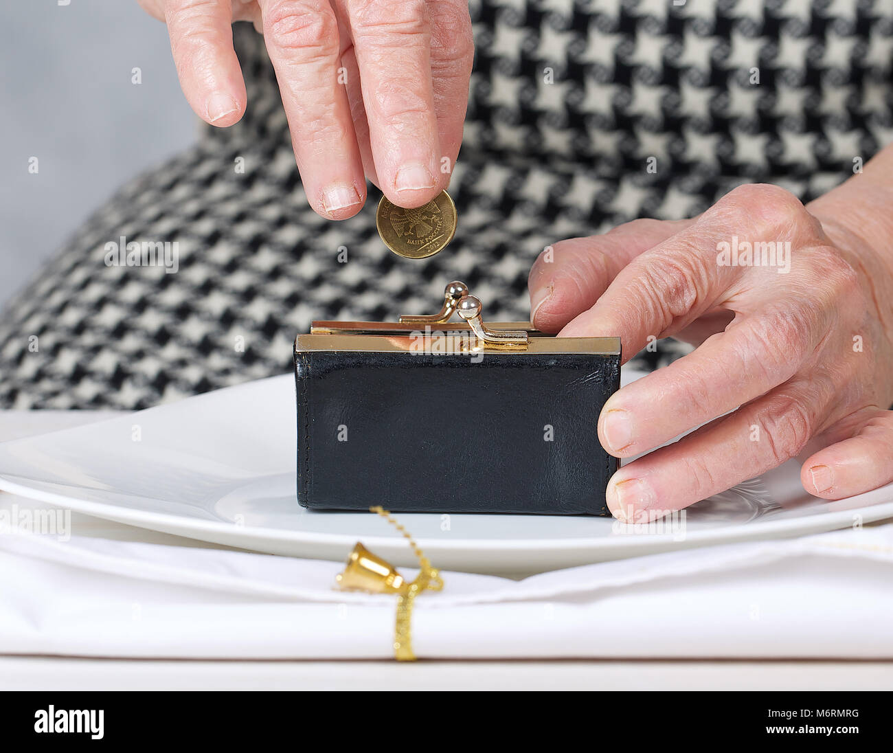 Old woman shows her empty lunch plate Stock Photo - Alamy