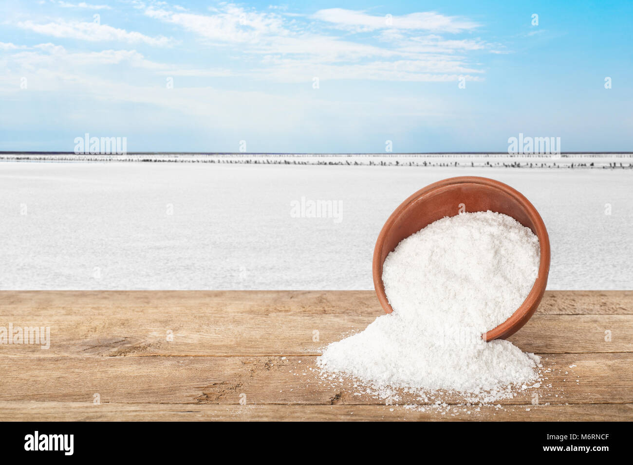 salt in bowl on table Stock Photo - Alamy