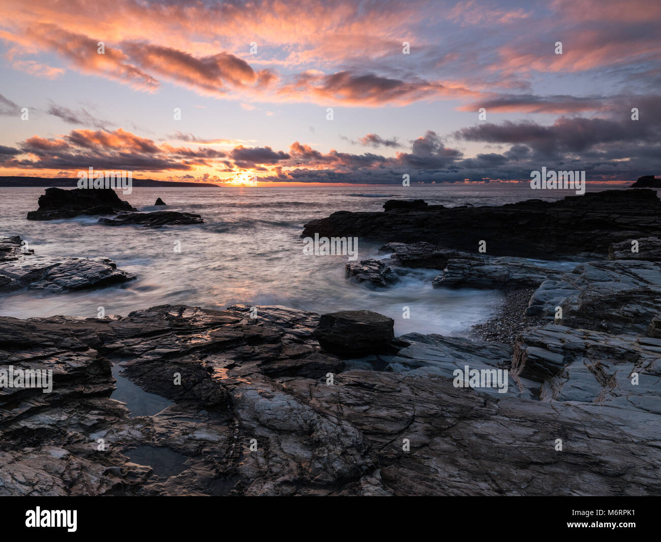 Godrevy beach rocks and Lighthouse Cornwall Stock Photo - Alamy