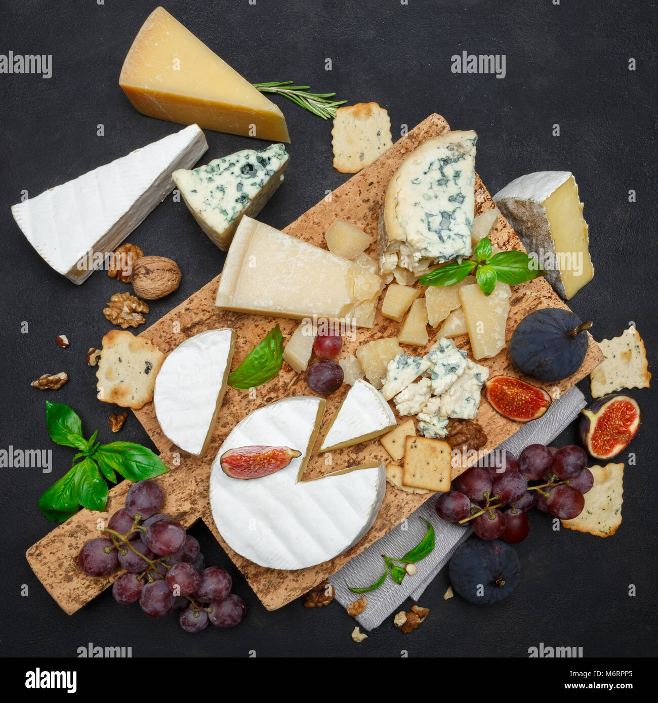 Various types of cheese - parmesan, brie, roquefort, cheddar Stock ...