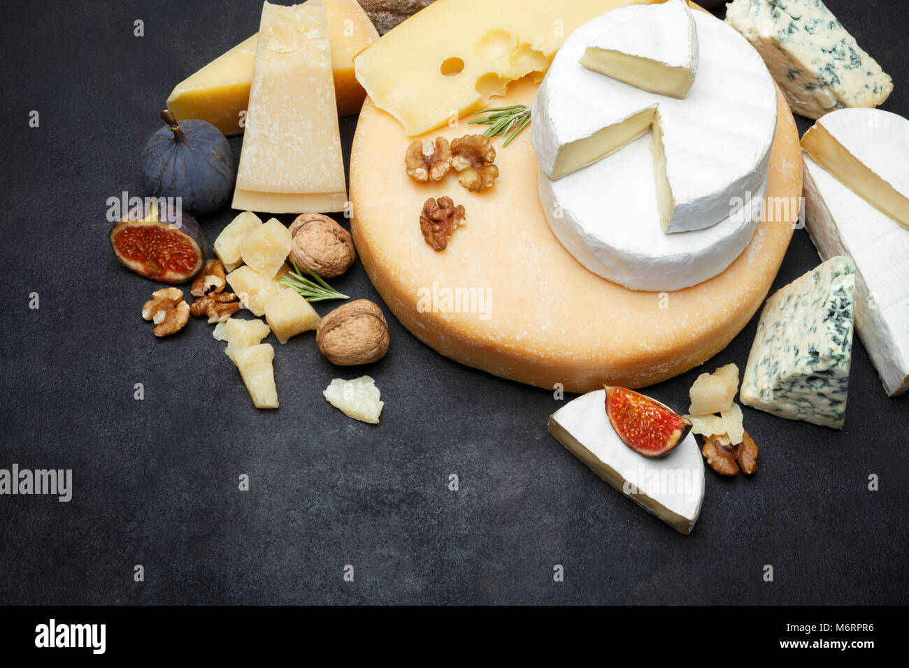 Various types of cheese - parmesan, brie, roquefort, cheddar Stock ...
