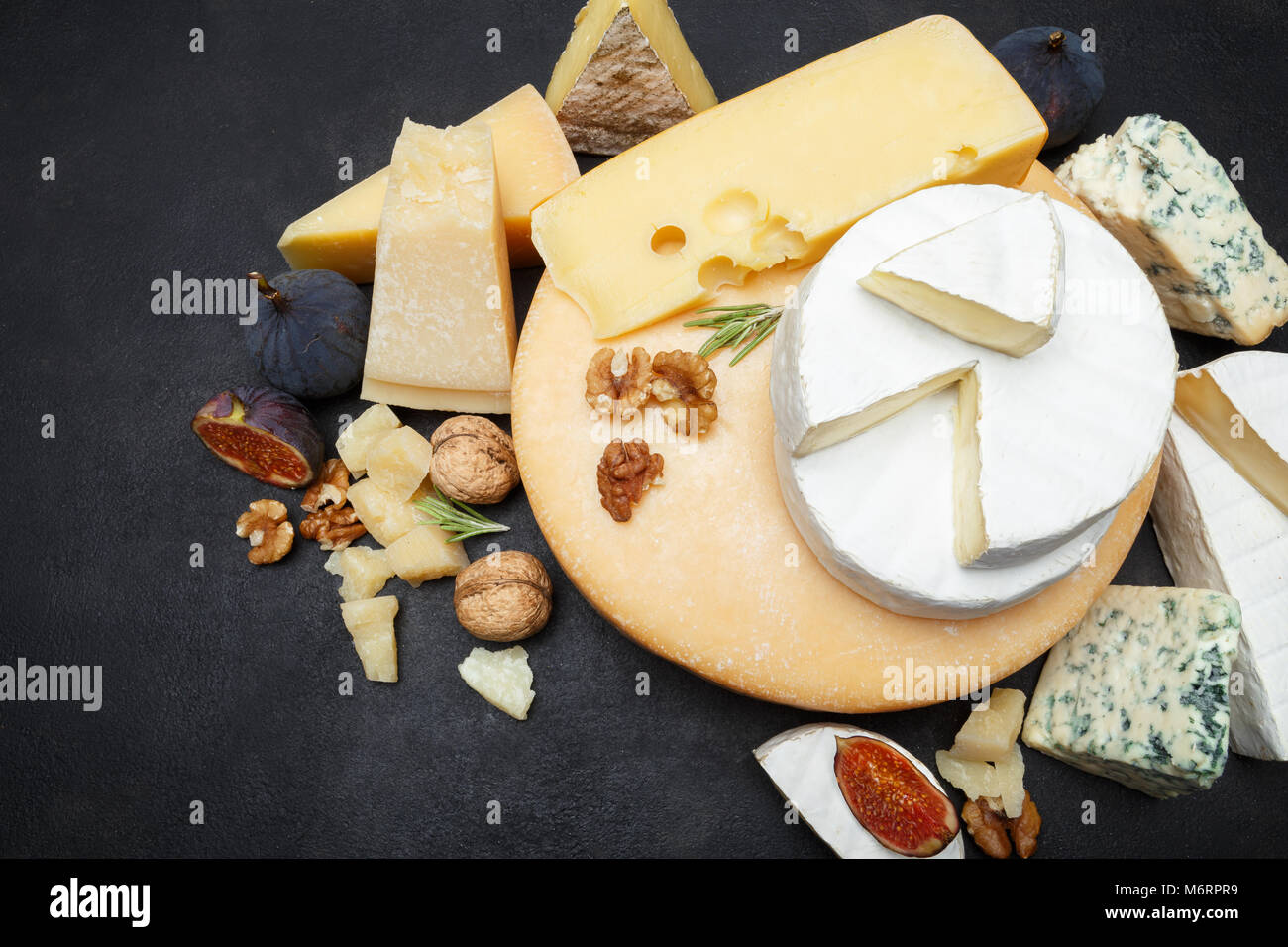 Various types of cheese - parmesan, brie, roquefort, cheddar Stock ...