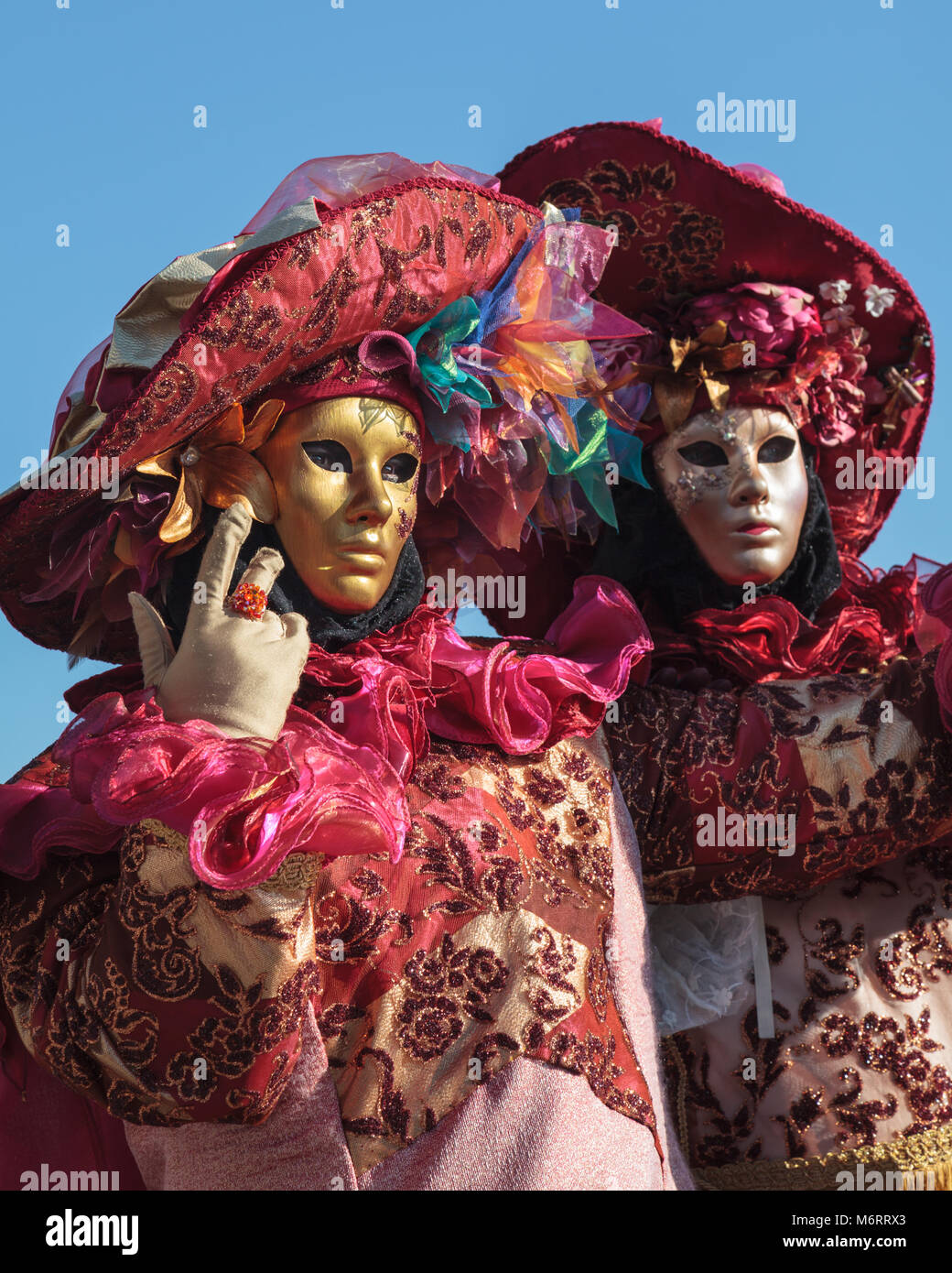 People in beautiful fancy dress costumes and mask at the Venice ...