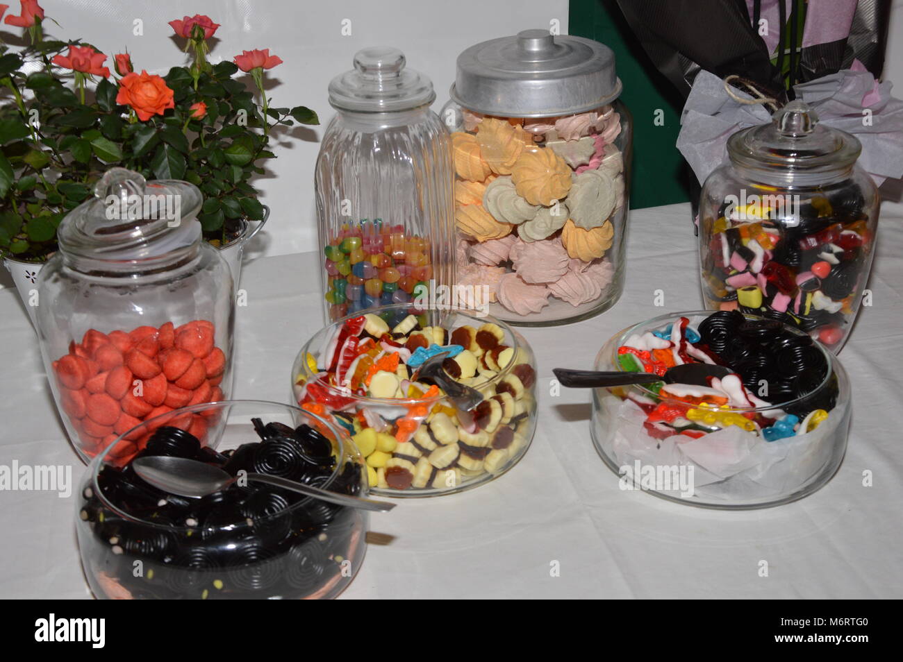 Zoom on different sweets on the table Stock Photo - Alamy