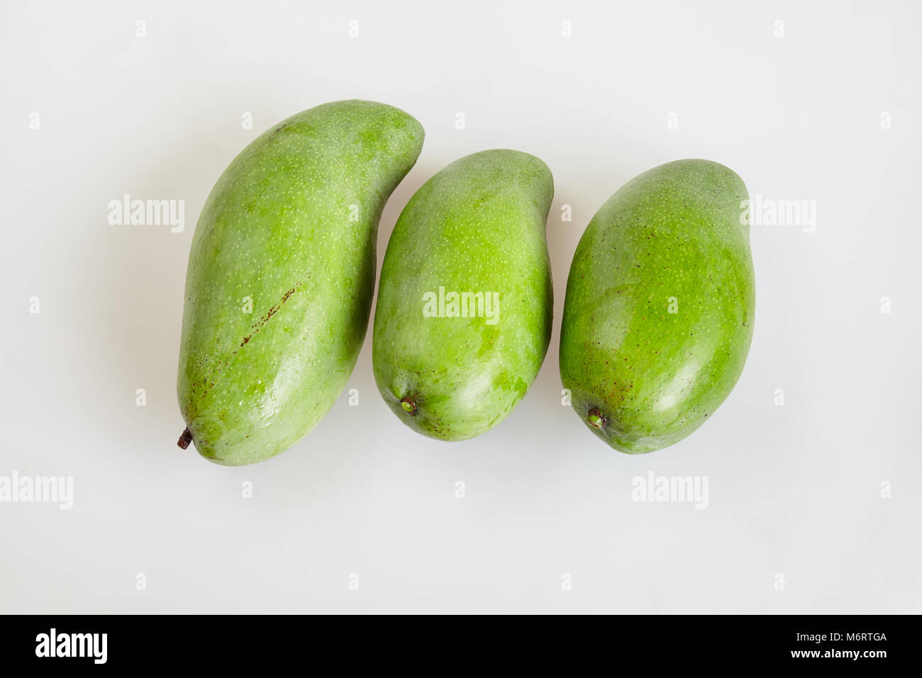 Group of raw fresh green mango on white background - isolated, closed ...
