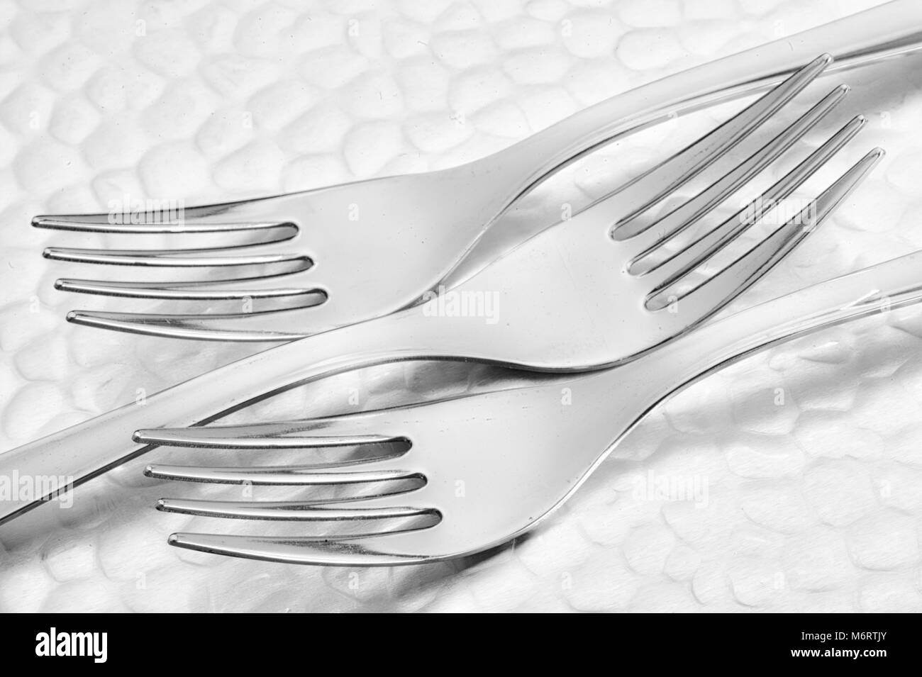 Three steel forks Stock Photo - Alamy