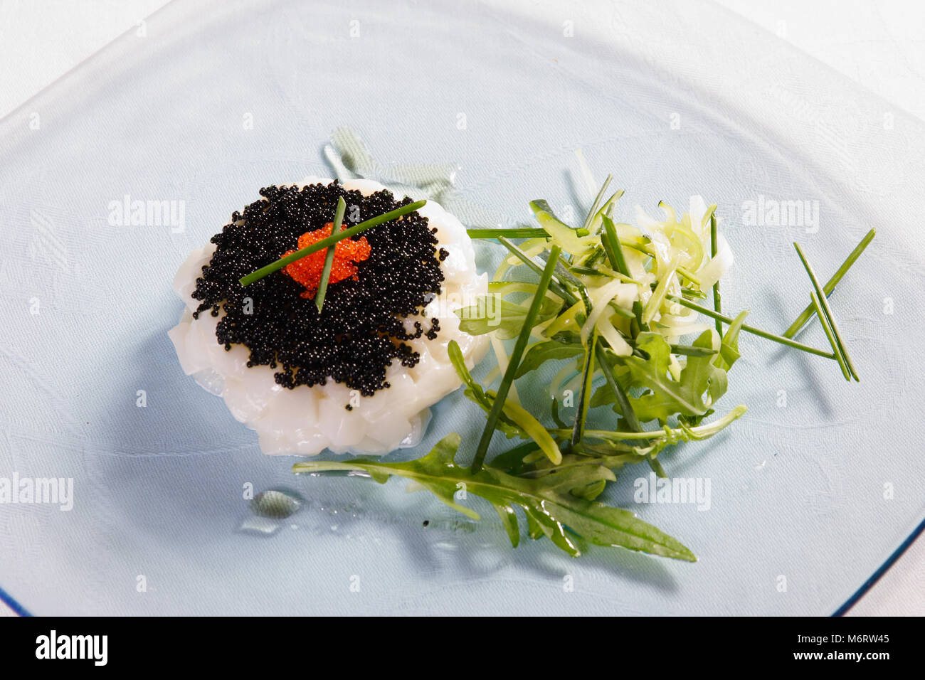 Red caviar, white caviar, fish and rucola Stock Photo - Alamy