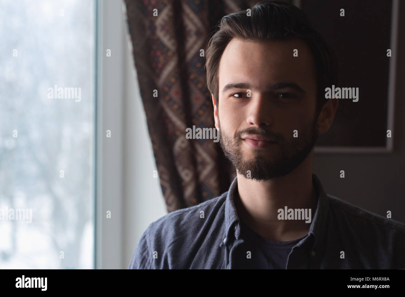 man near the window Stock Photo - Alamy
