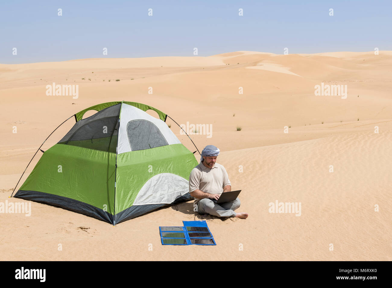 Man Using Laptop Computer Camping High Resolution Stock Photography and ...