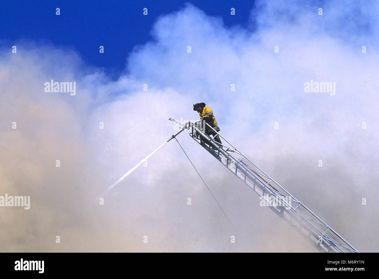 Aerial ladder firefighter hi-res stock photography and images - Alamy