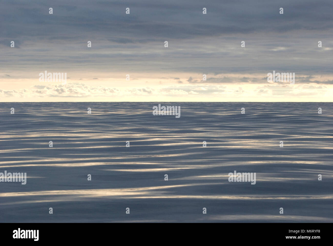 Surreal water of the Atlantic ocean at sunset Stock Photo - Alamy