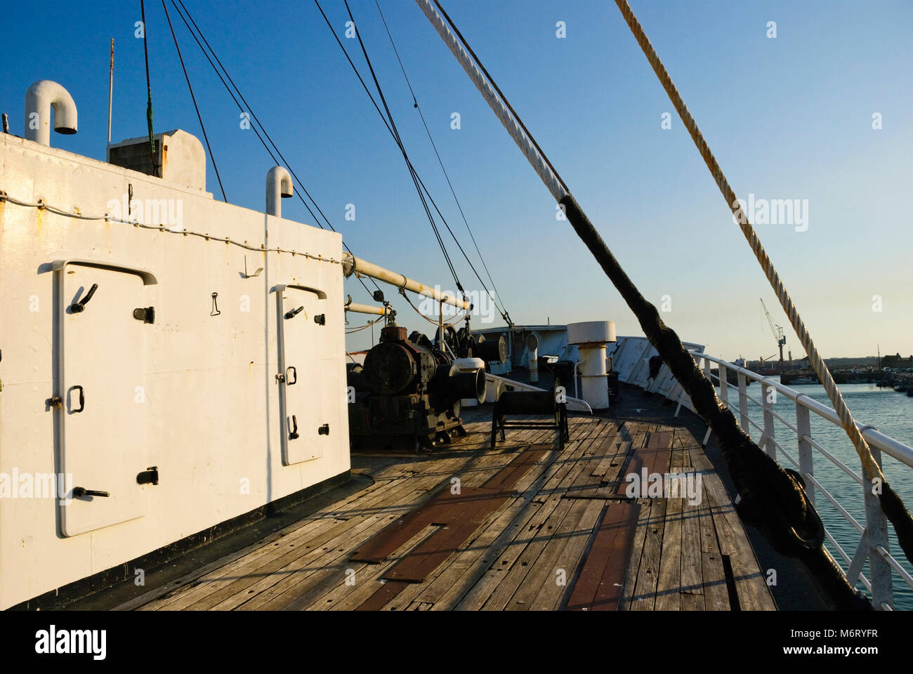On the top of ship upper deck, with fence, cabin and wires Stock Photo ...