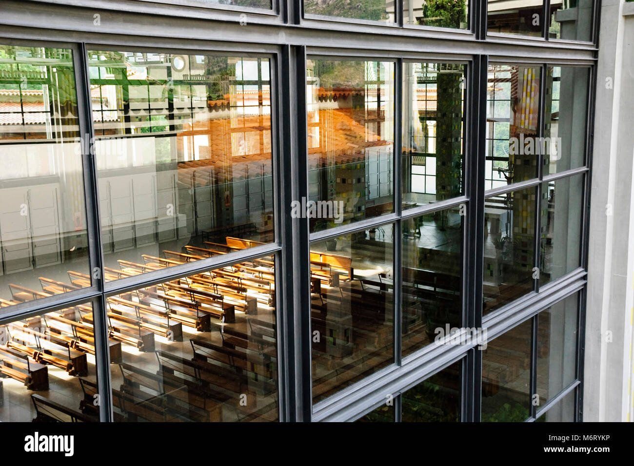 View trough transparent windows inside modern building Stock Photo - Alamy