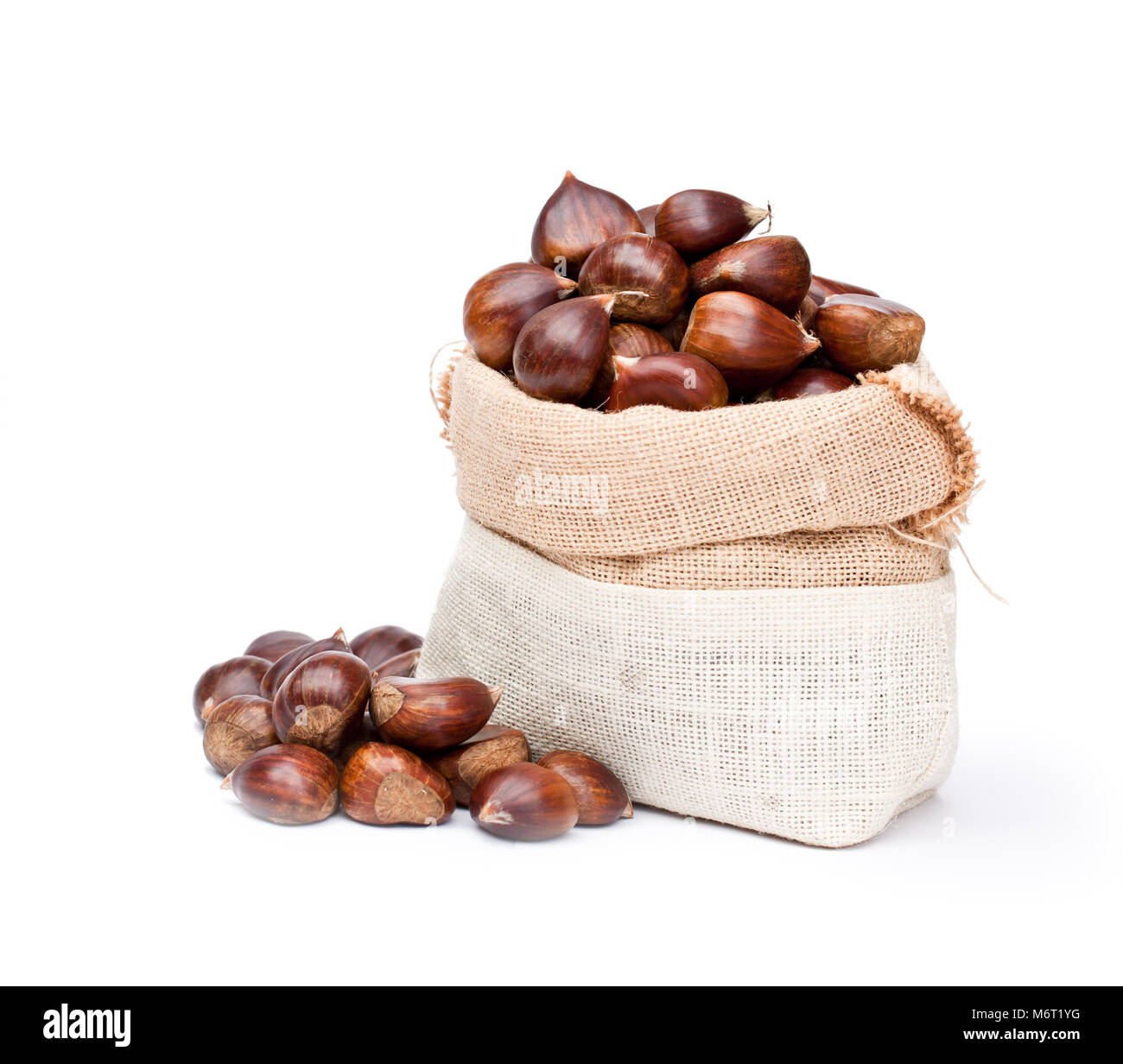 fresh chestnuts in sack bag on white background Stock Photo - Alamy
