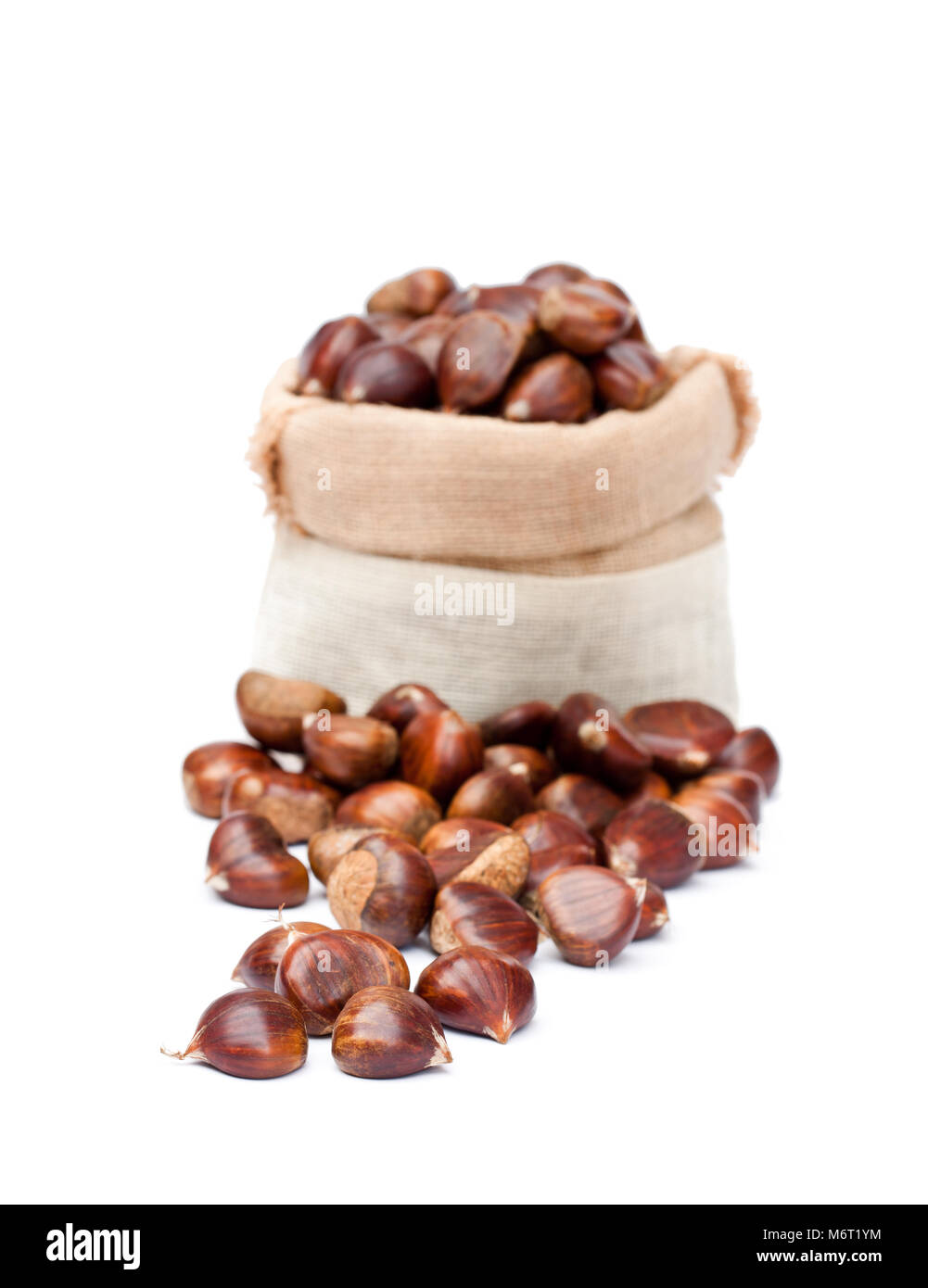 fresh chestnuts in sack bag on white background Stock Photo - Alamy