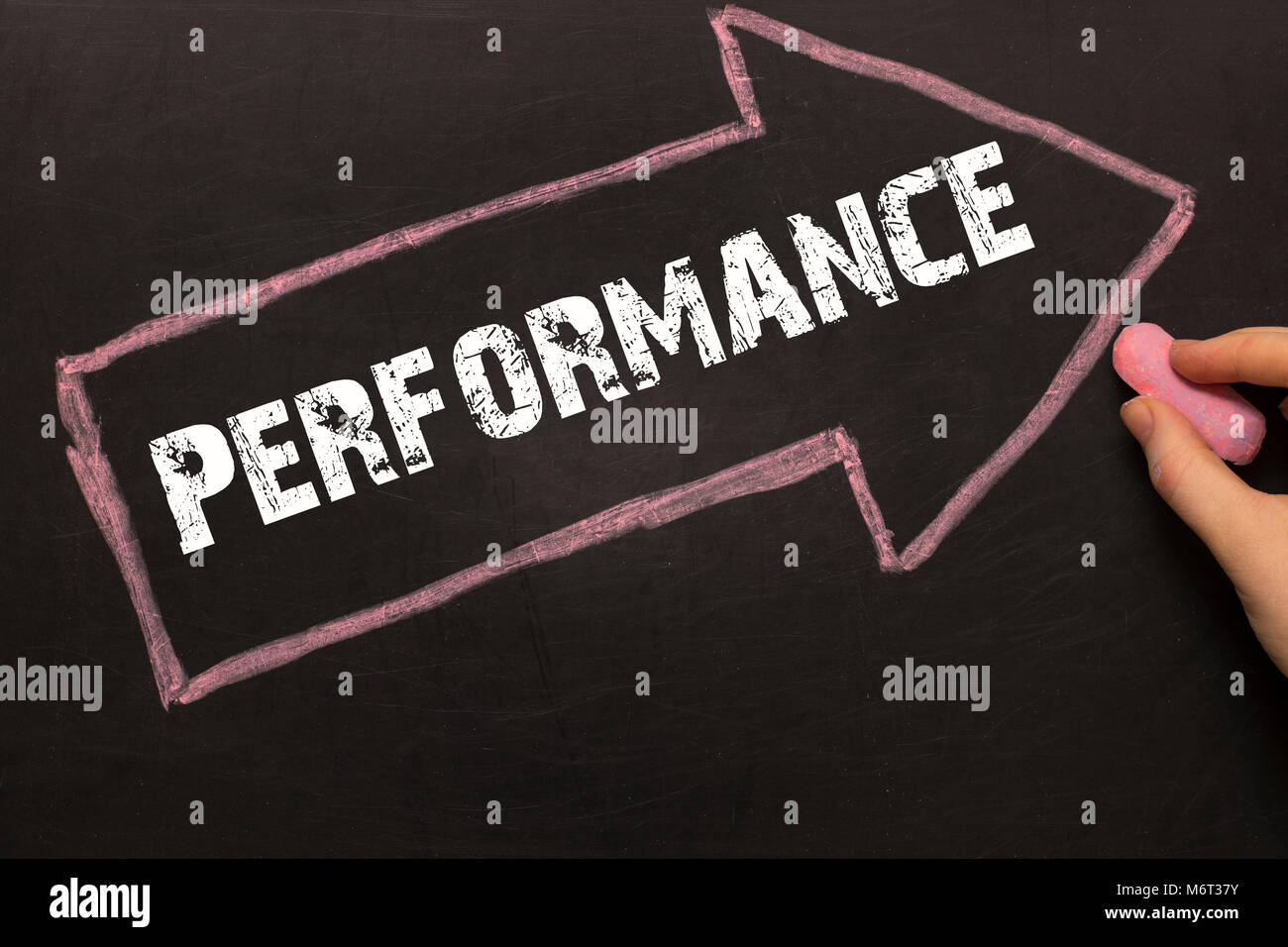 Performance - Chalkboard with arrow on black background Stock Photo - Alamy