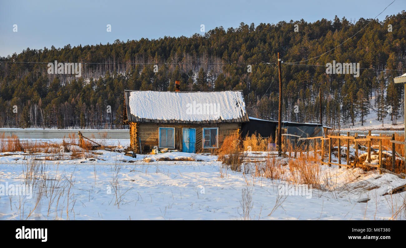 A wooden house at snow village in Mohe County, Heilongjiang Province ...