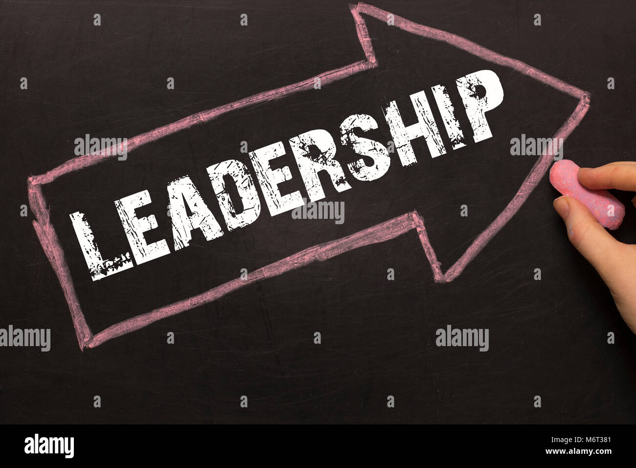 Leadership - Chalkboard with arrow on black background Stock Photo - Alamy
