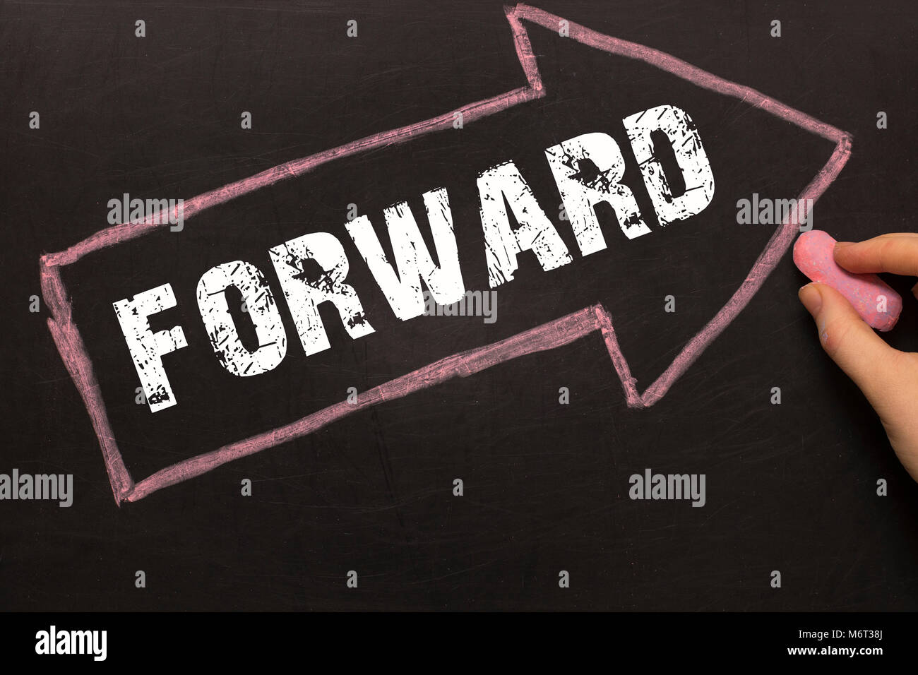 Forward - Chalkboard with arrow on black background Stock Photo - Alamy