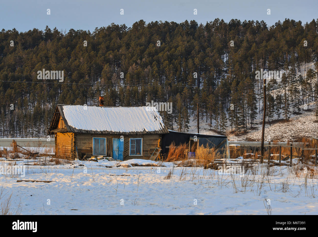 A wooden house at snow village in Mohe County, Heilongjiang Province ...