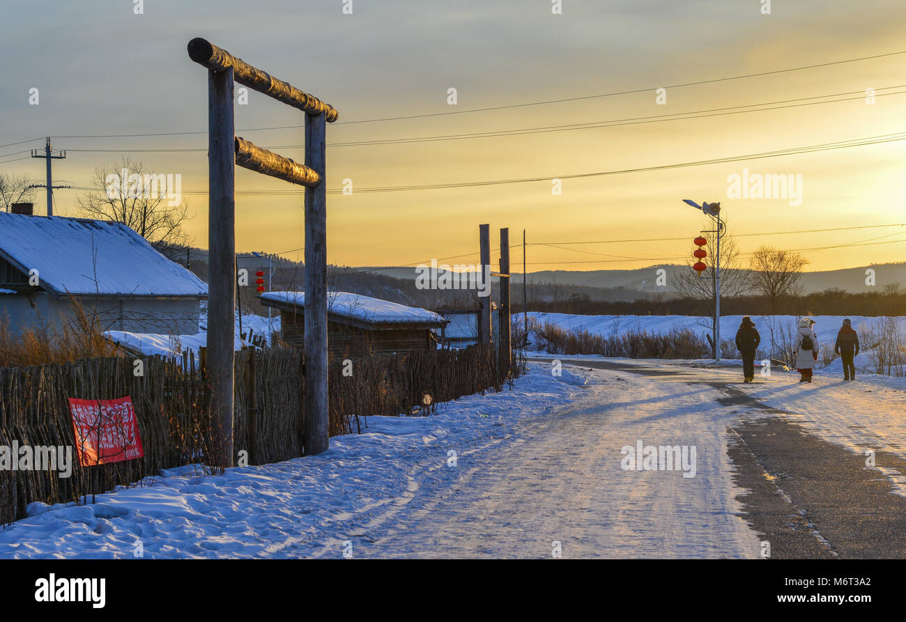 Mohe, China - Feb 19, 2017. Tourists walking at snow village in Mohe ...