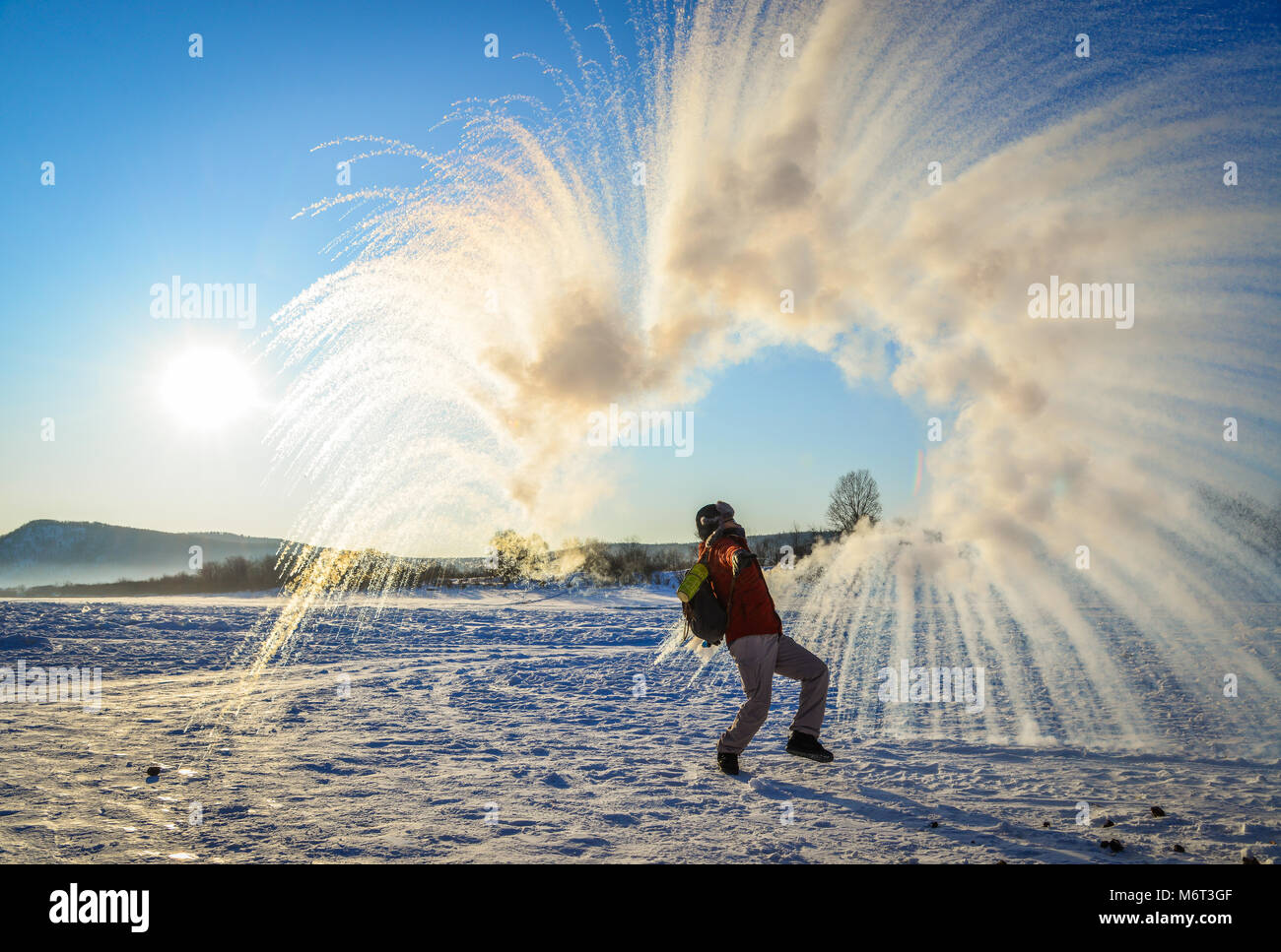 Throwing water winter hi-res stock photography and images - Alamy