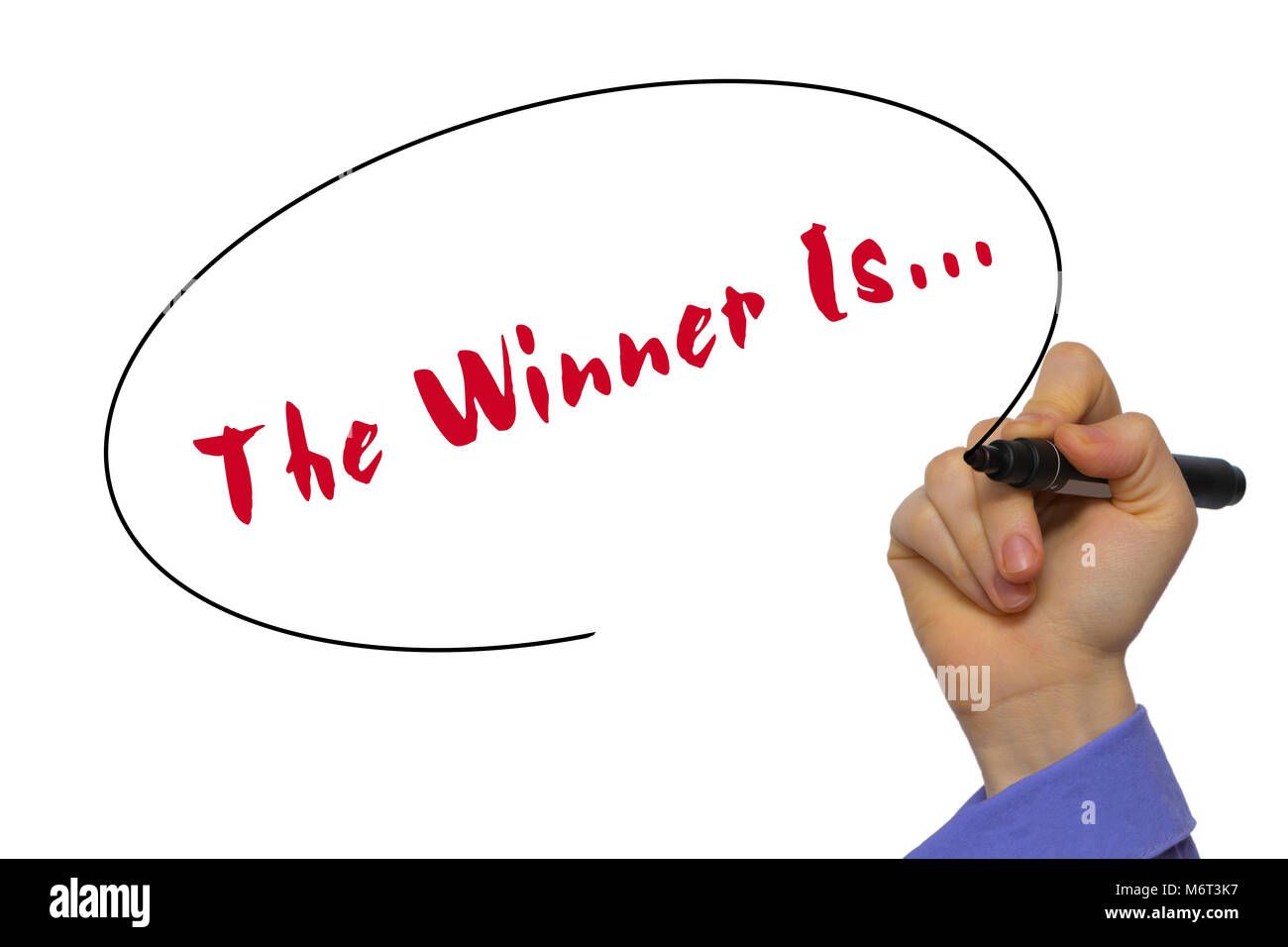 Woman Hand Writing The Winner Is... on blank transparent board with a ...