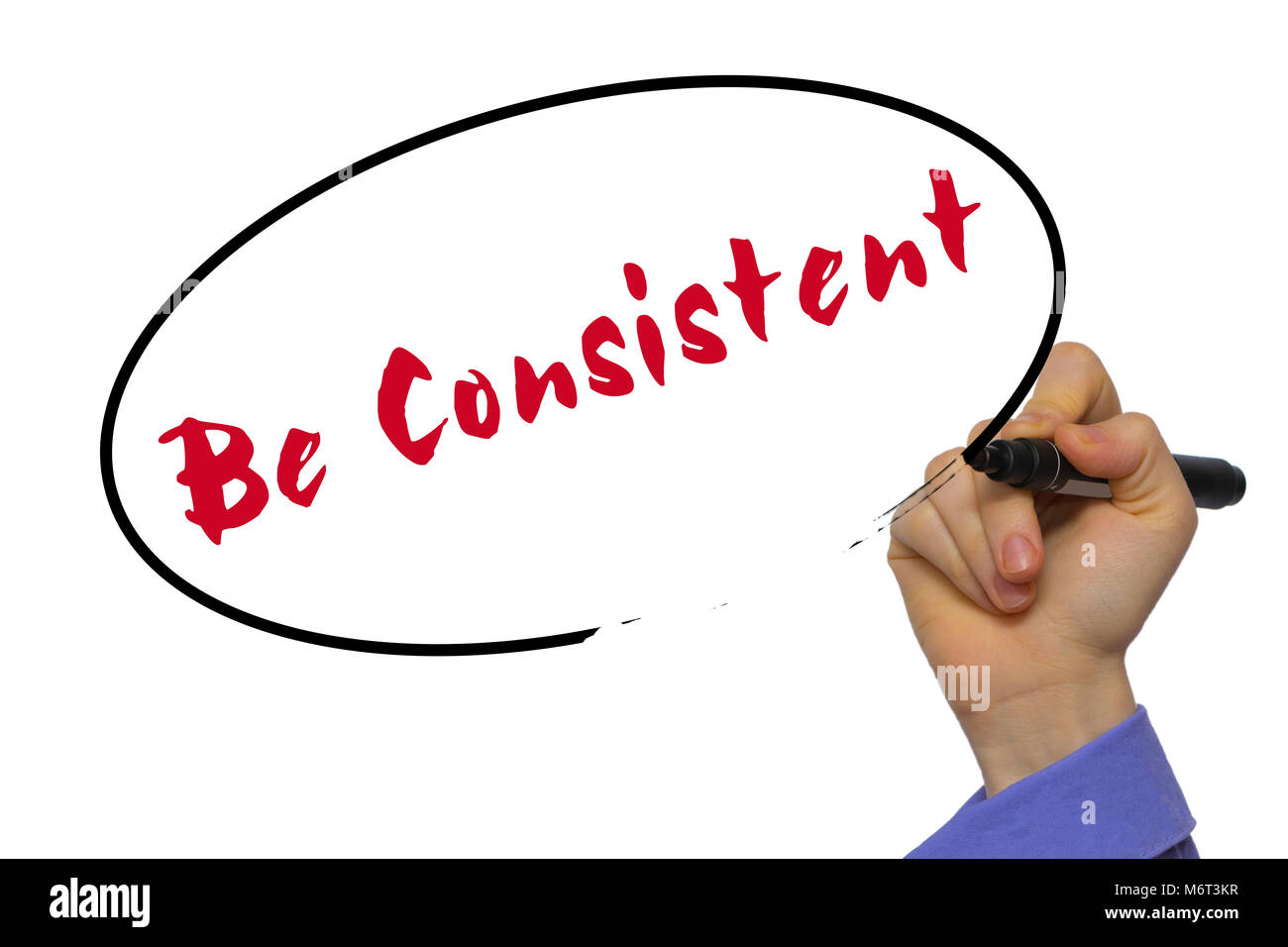 Woman Hand Writing Be Consistent on blank transparent board with a ...