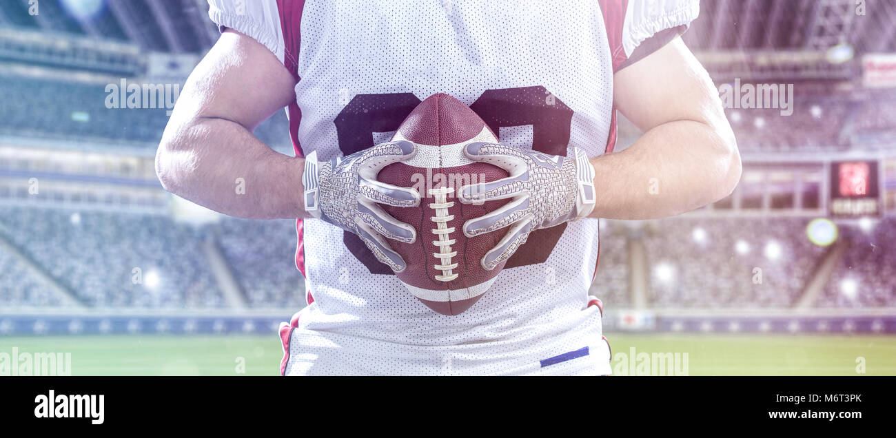Closeup Portrait of a strong muscular American Football Player on big ...