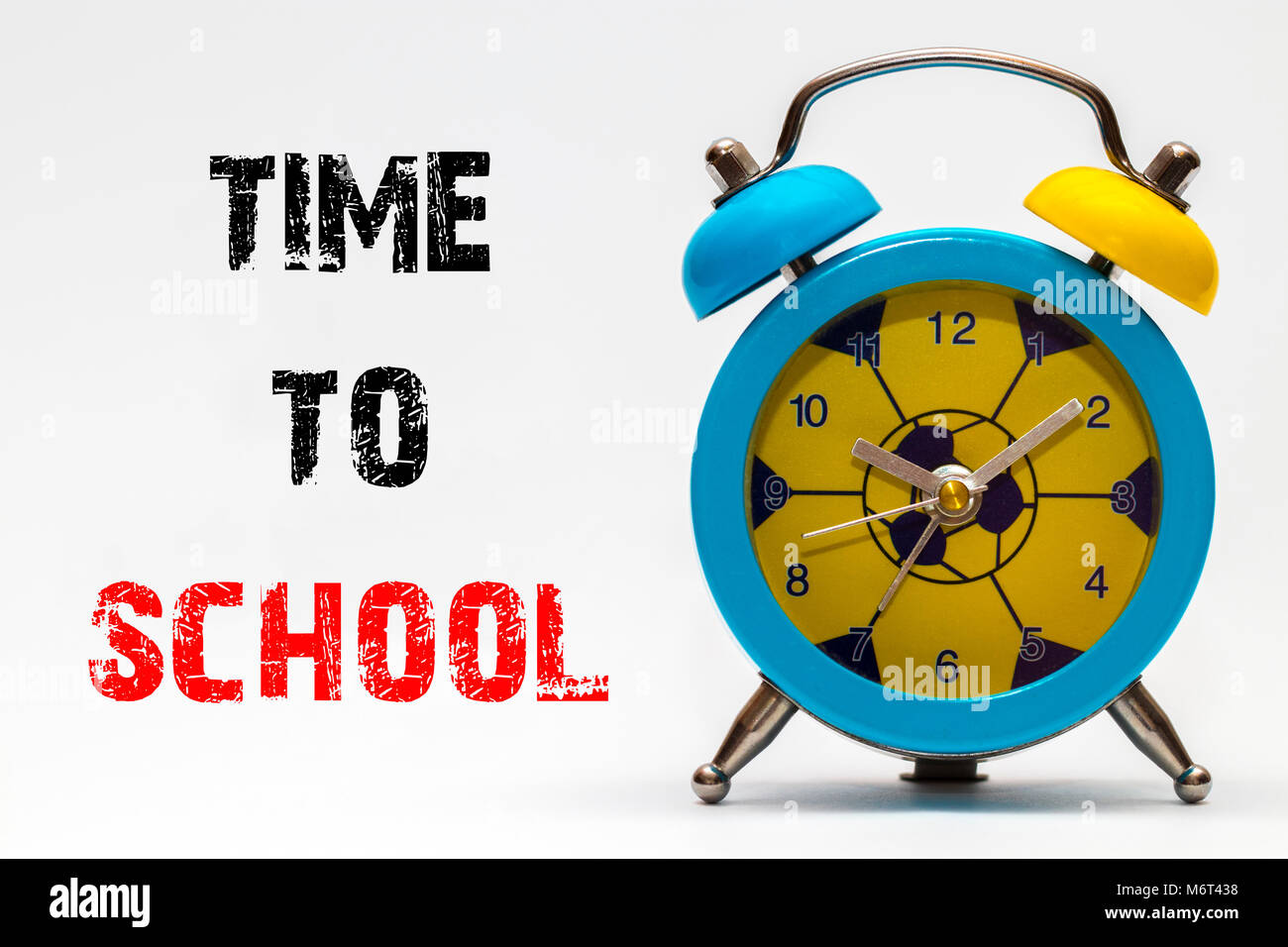 Time to School on a white background. Retro alarm clock Stock Photo - Alamy