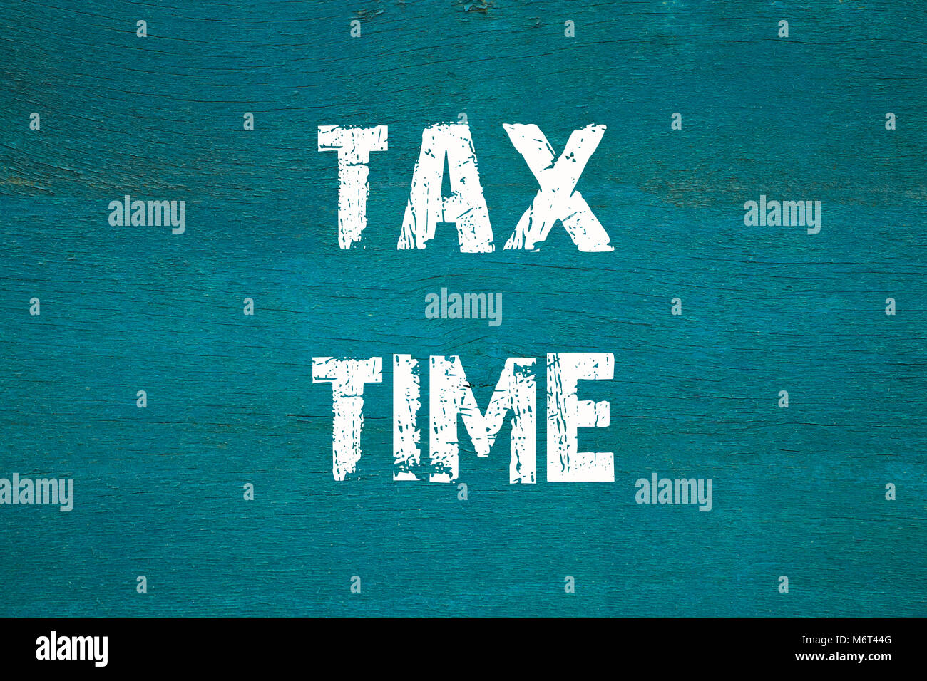 Concept, tax time - phrase written on old green background Stock Photo ...