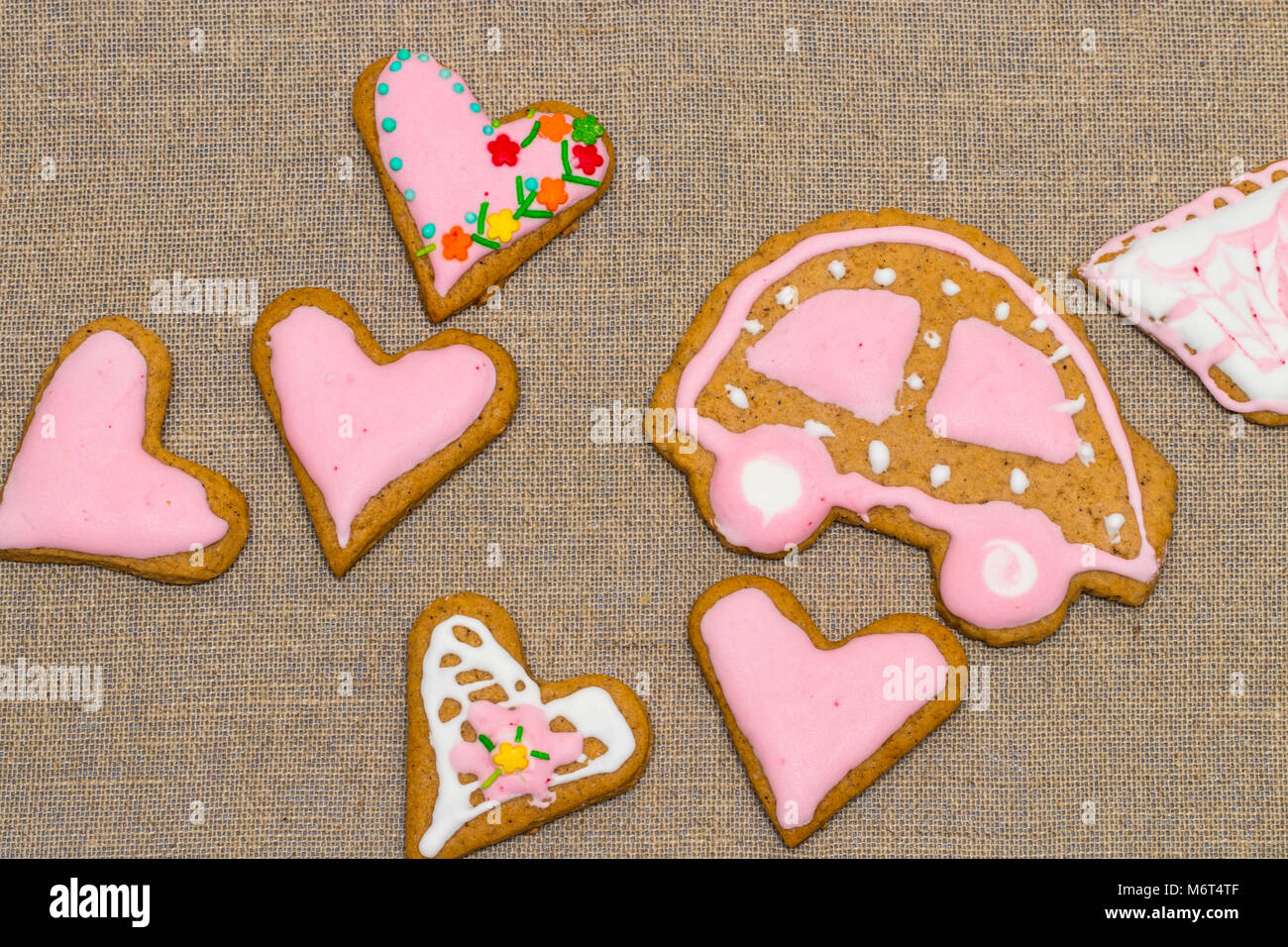 baby cookie on burlap in a heart shape Stock Photo - Alamy