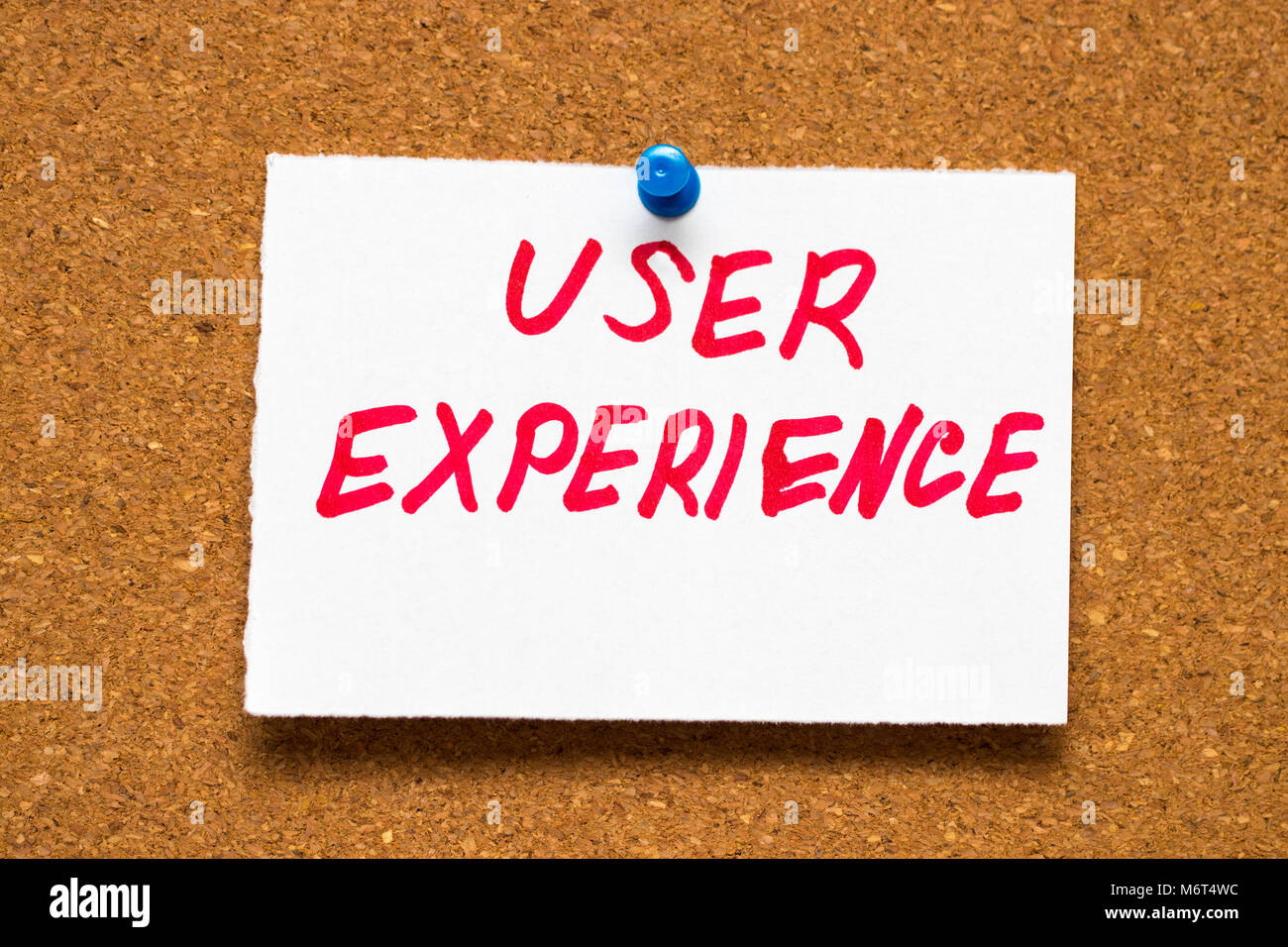 user experience written by hand, hand writing on corkboard Stock Photo ...