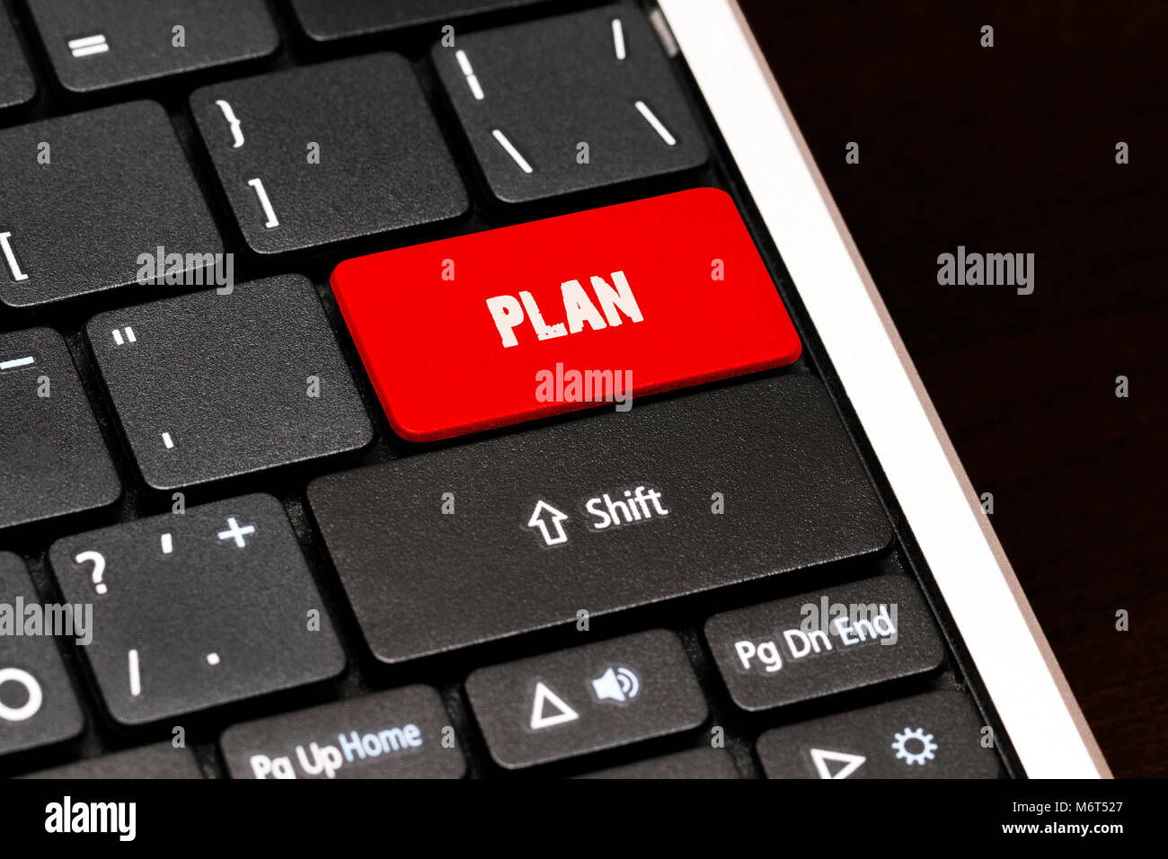 plan on Red Enter Button on black keyboard Stock Photo - Alamy