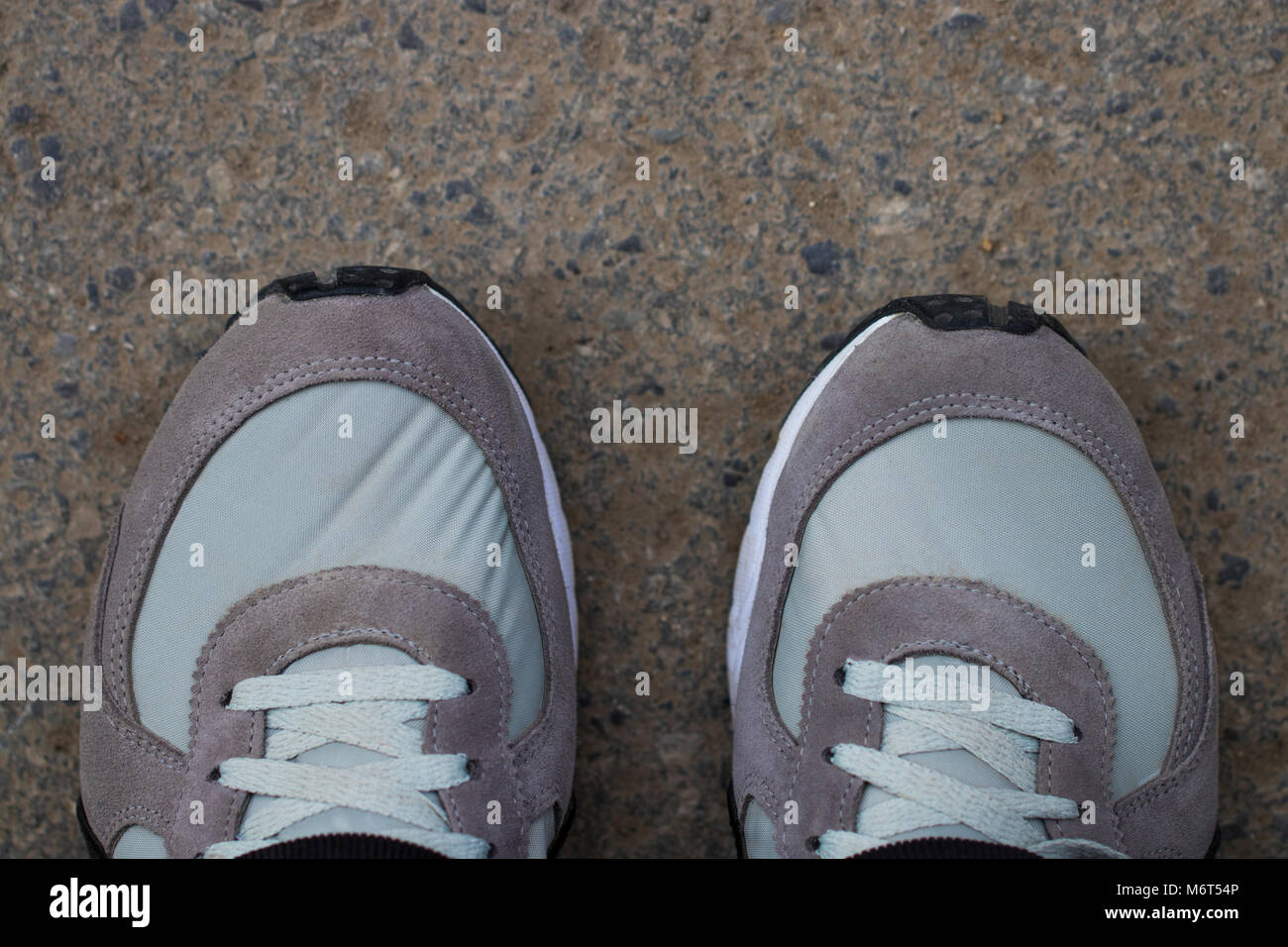 Socks on the ground with a view from the top Stock Photo - Alamy