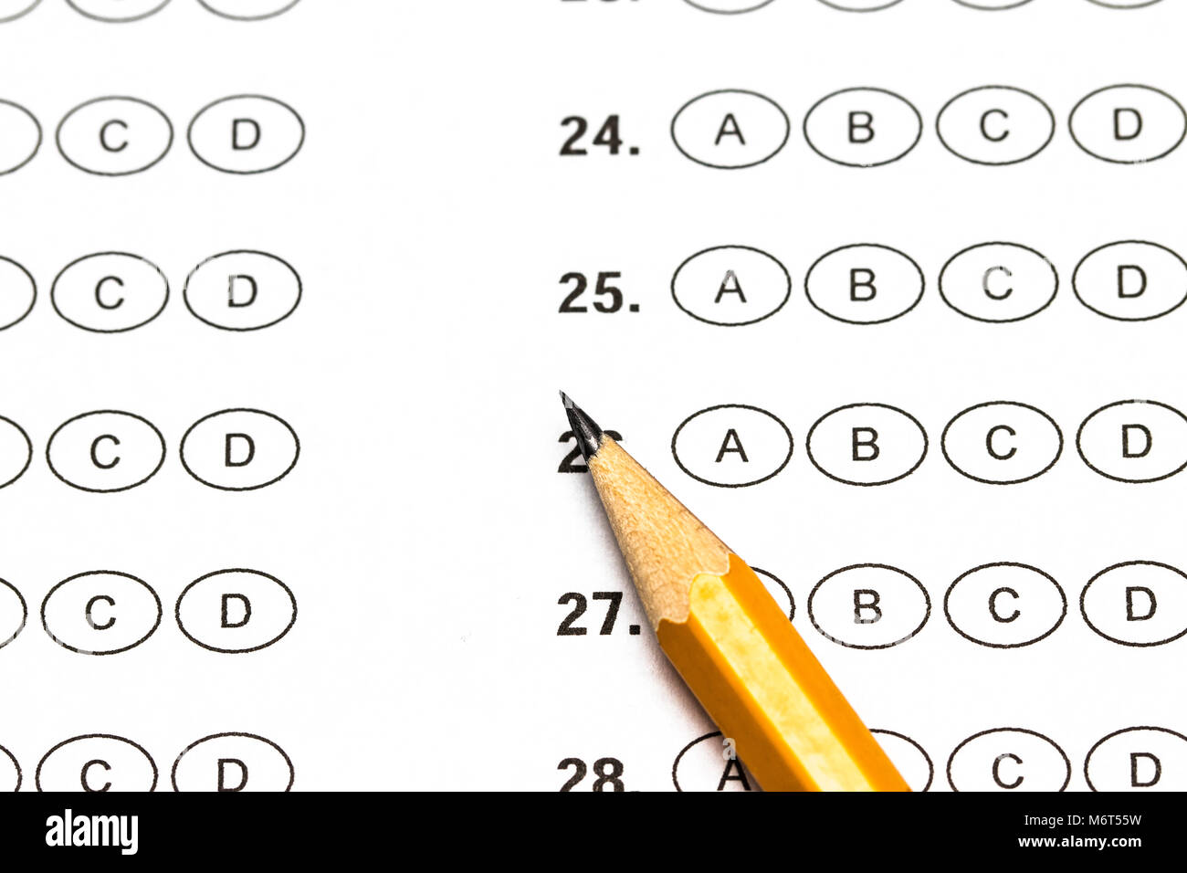 Test score sheet with answers and pencil Stock Photo - Alamy