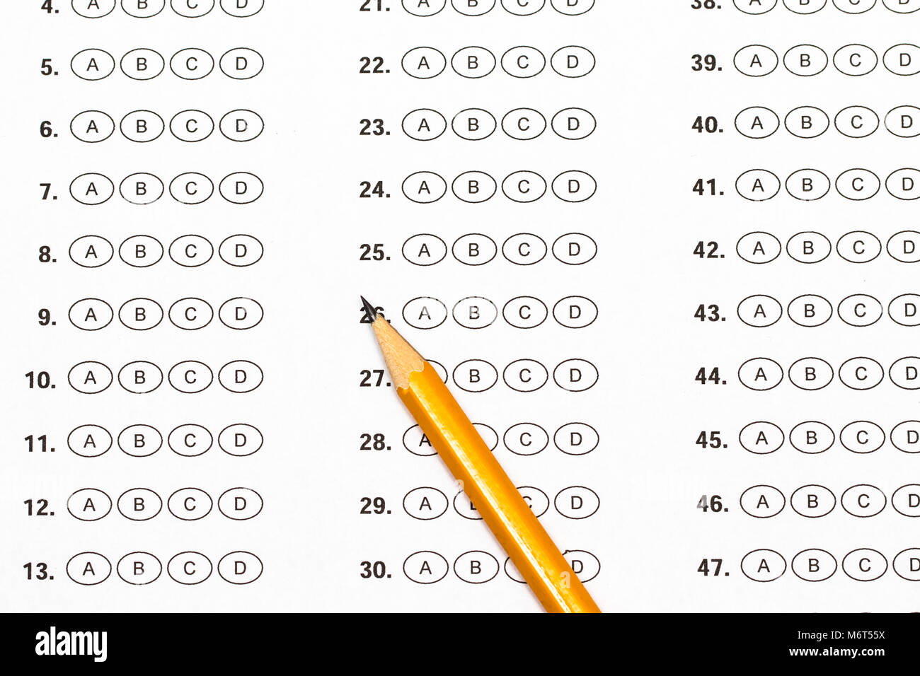 Test score sheet with answers and pencil Stock Photo - Alamy