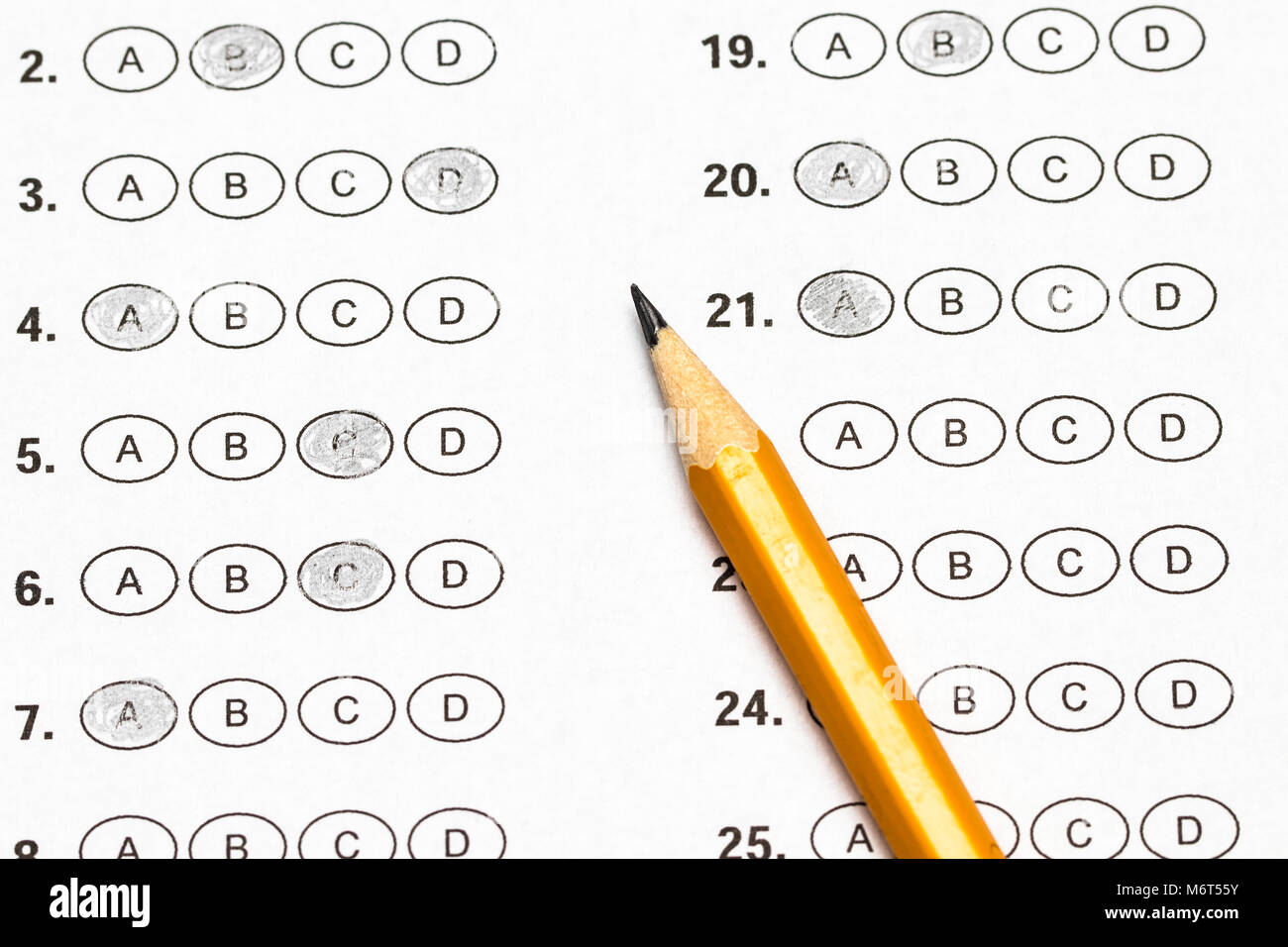 Test score sheet with answers and pencil Stock Photo - Alamy