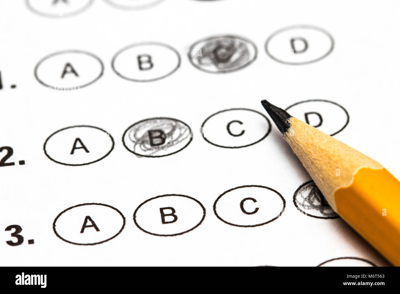 Test score sheet with answers and pencil . Closeup Stock Photo - Alamy