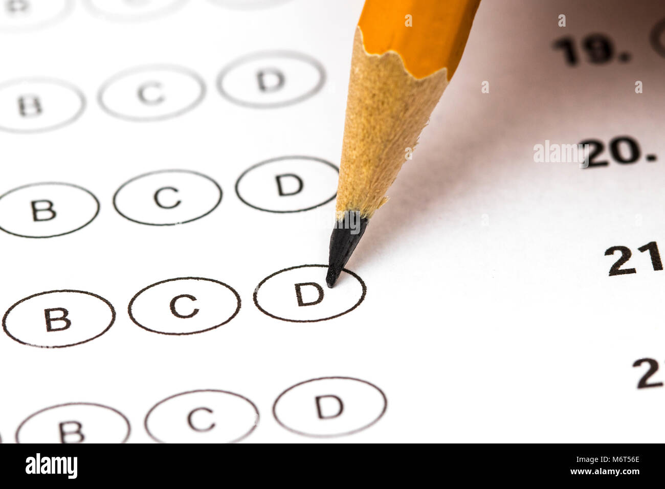 Test score sheet with answers and pencil . Closeup Stock Photo - Alamy