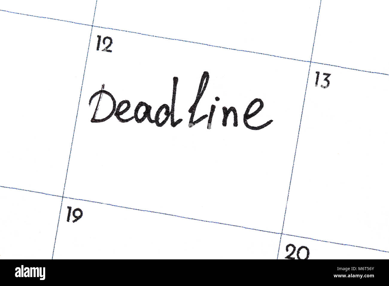 "Deadline" is the text written on the calendar with a black marker ...